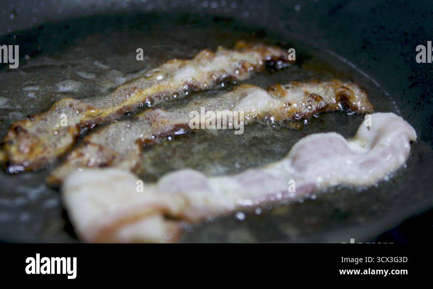 Cooking crispy bacon in frying Stock Videos & Footage - HD and 4K Video ...