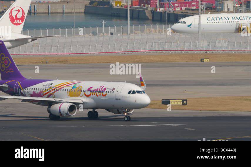 Airplane turn runway before departure from International Airport, Hong ...