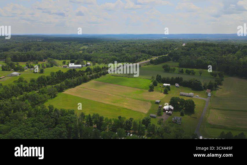 A scenic view of farmer village in the forest on mountains Pocono of ...