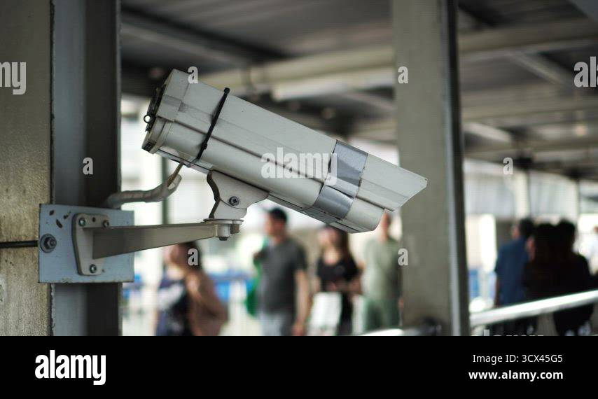City cctv surveillance over street, people and public traffic video 4k ...
