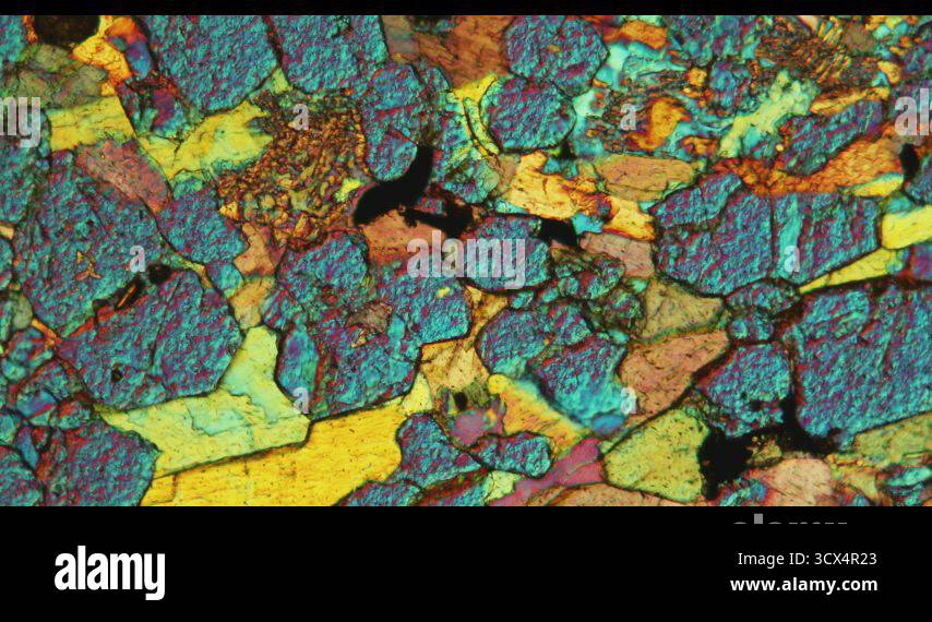Eklogit thin section of stone under the microscope Stock Video Footage ...