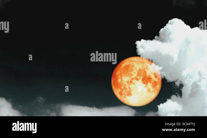full blood moon rise on the night sky and orange cloud moving pass ...