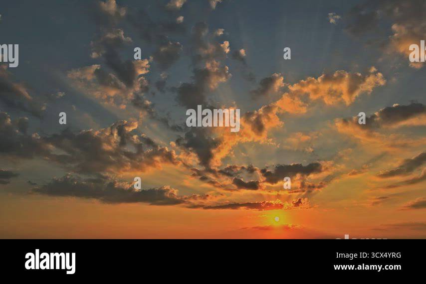 Large beautiful sun beam orange sunset sky dramatic time lapse sunset ...