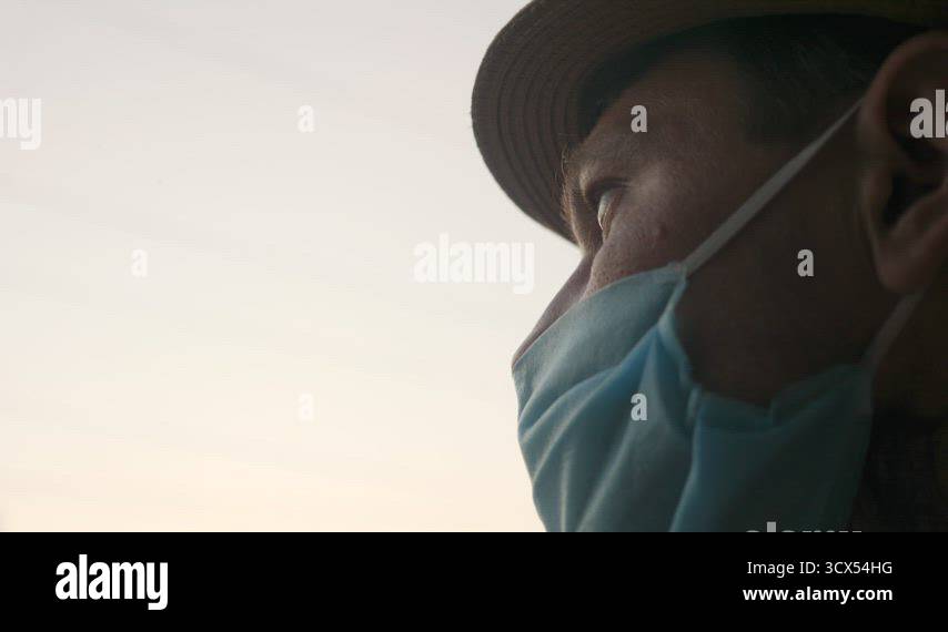 Young man in protective mask while traveling by train. Prevention from ...