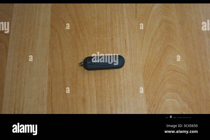 Man takes USB stick from the desk, opens it Stock Video Footage - Alamy