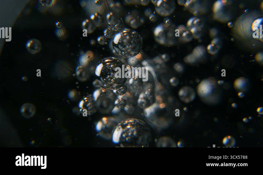 Frozen orbs in water texture Stock Video Footage - Alamy