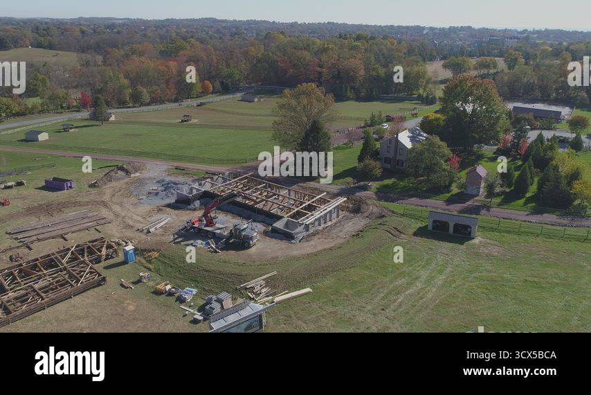 Aerial view of an old timber frame barn being rebuilt and restored ...