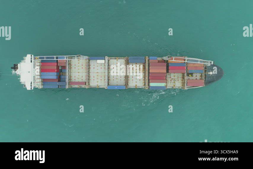 Container Ship in the Sea. Aerial Vertical Top-Down View. Drone is ...