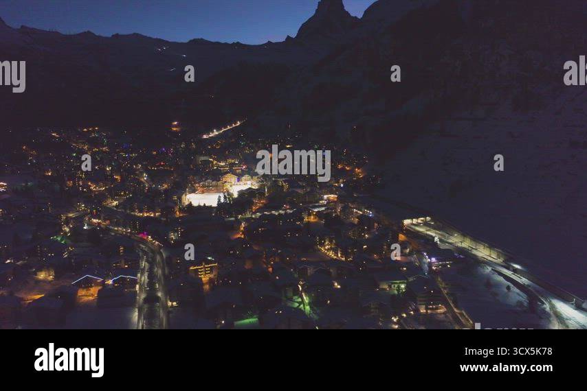 Illuminated Zermatt Village and Matterhorn Mountain at Winter Night ...