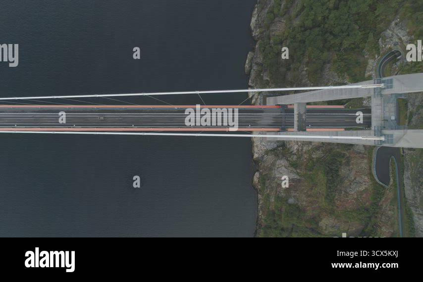 Hardanger Suspension Bridge across the Hardangerfjord with Passing Car ...