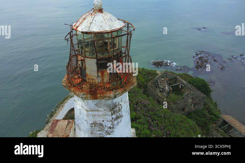 View from above. Flying over the picturesque Rudny lighthouse in the ...