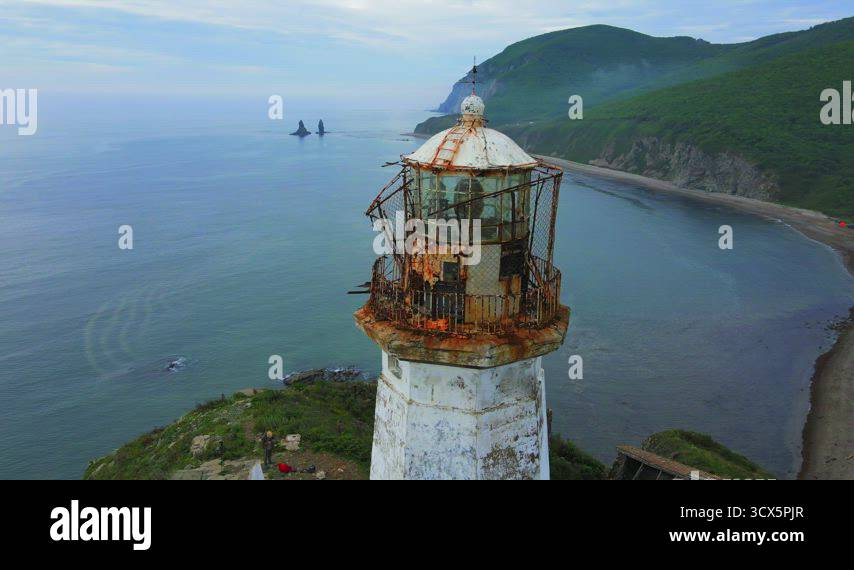View from above. Flying over the picturesque Rudny lighthouse in the ...