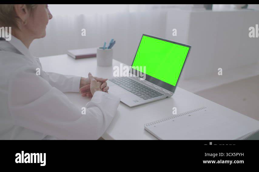 online appointment with doctor, woman physician is looking at green ...