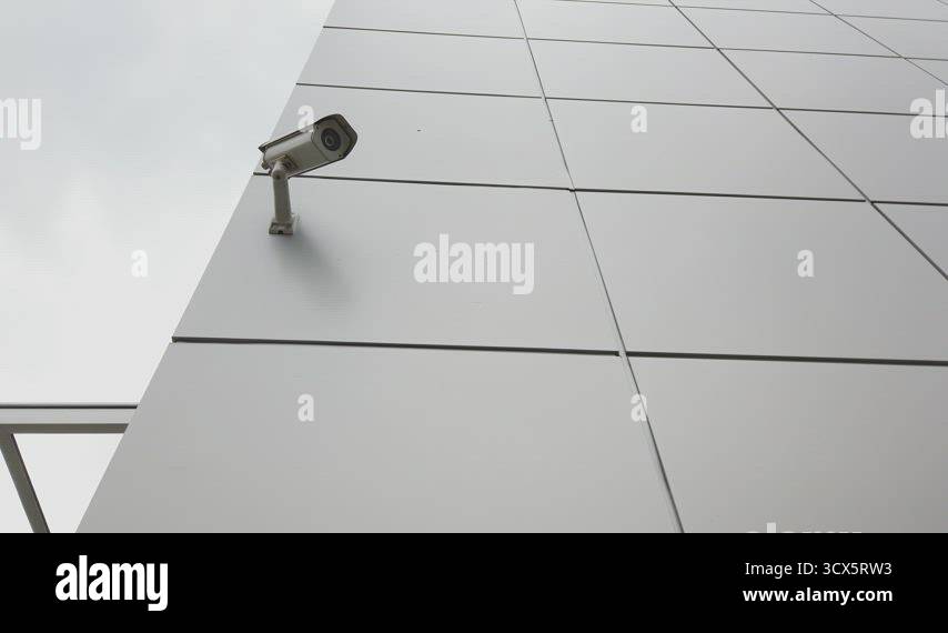 video surveillance cameras mounted on a wall of a modern building Stock ...
