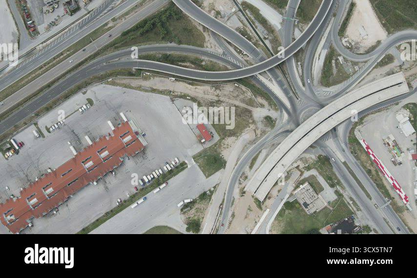Aerial drone landscape of interchange traffic on a ring road with grade ...