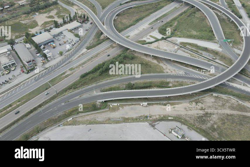 Aerial drone landscape of interchange traffic on a ring road with grade ...