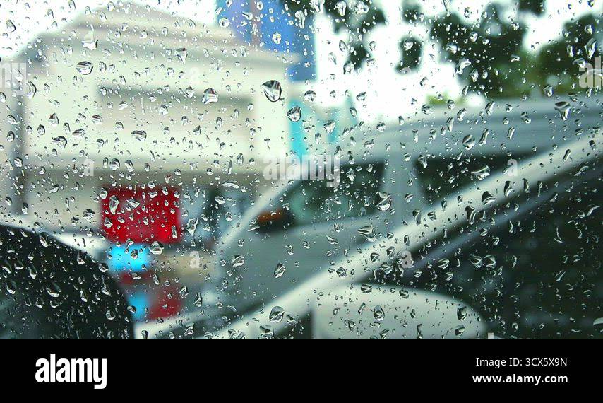 rain drop and driver is park car in the parking area Stock Video ...