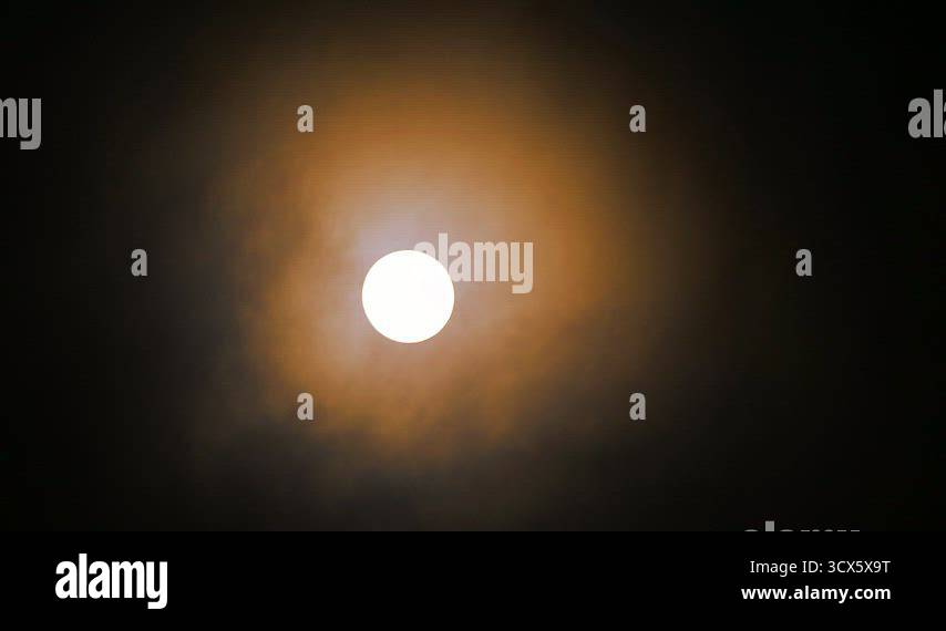 full moon orange moonlight on the night sky and cloud passing time ...