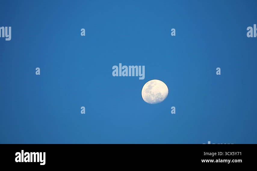 half moon rise on the dark blue sky time lapes Stock Video Footage - Alamy