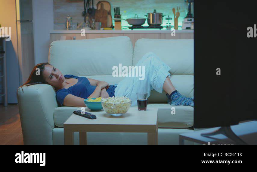 Woman watching tv feeling bored Stock Videos & Footage - HD and 4K ...