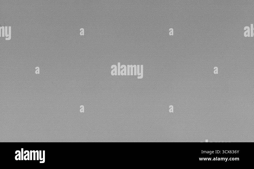 Frame effects white noise corrupted TV on gray background large grain ...