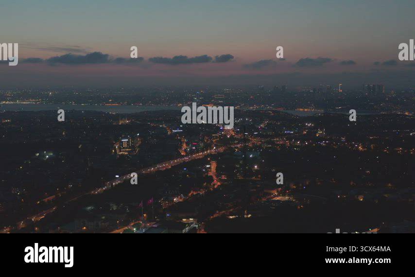 Istanbul at Night with City Lights and Turkish Flag waving, Aerial ...