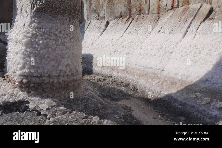 Drying Kuyalnik estuary. Crystals of self-precipitating salt on old ...