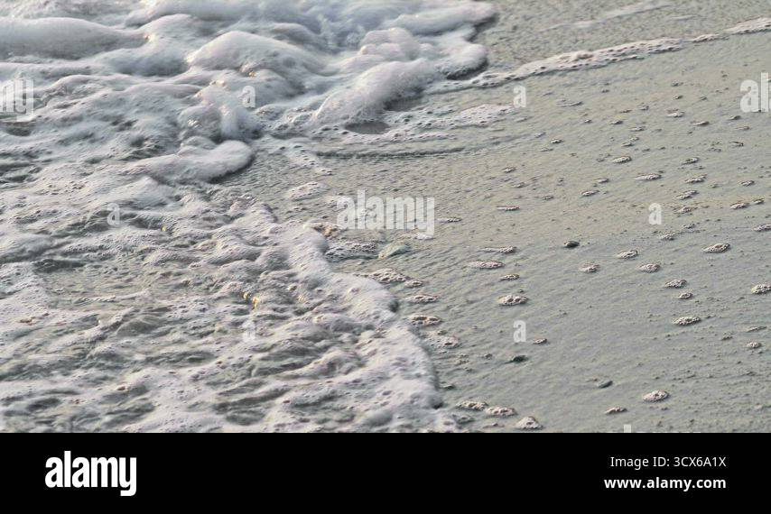 beach wave macro slow motion 4k Stock Video Footage - Alamy