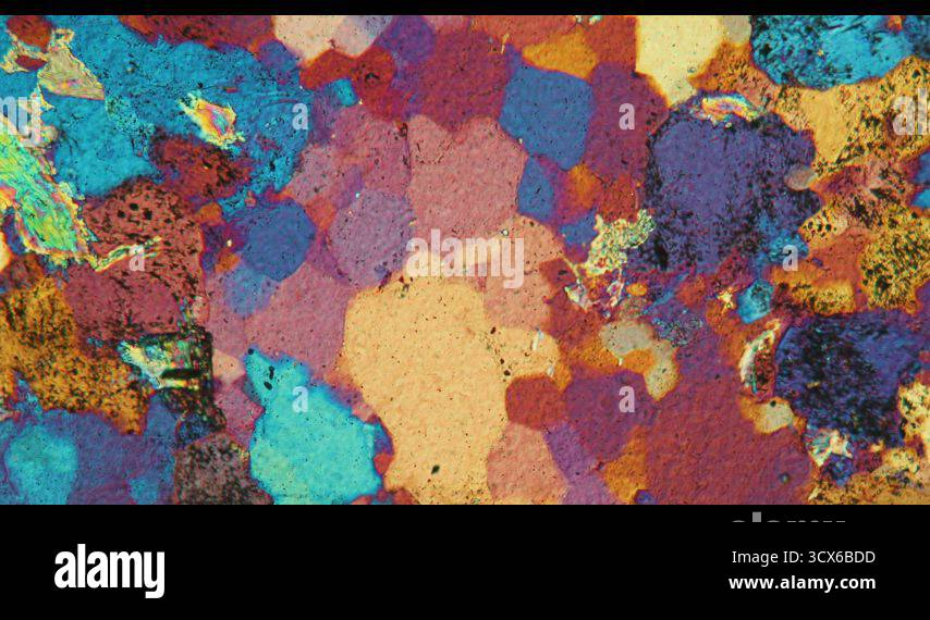Gneiss thin section of stone under the microscope Stock Video Footage ...