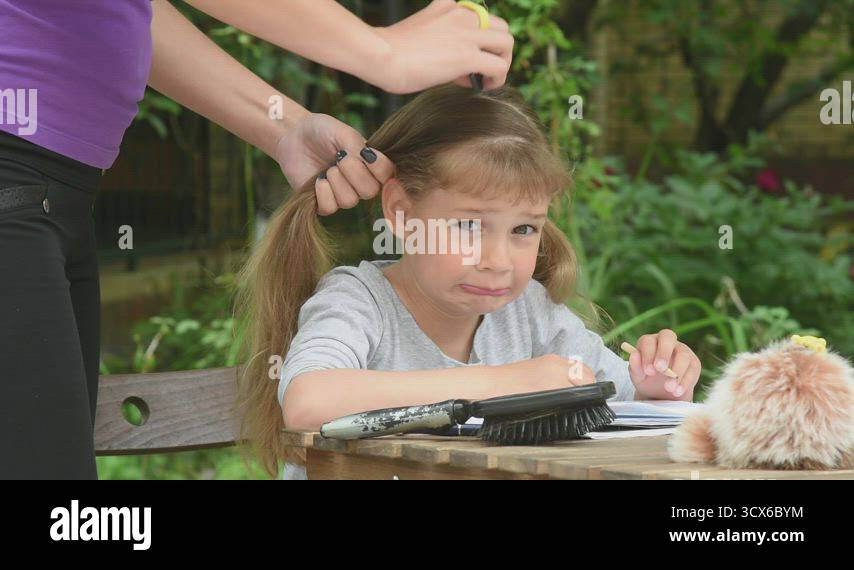 Painful combing tangled hair Stock Videos & Footage - HD and 4K Video ...