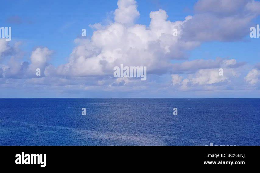 Aerial travel of tranquil seashore beach adventure by blue water and ...