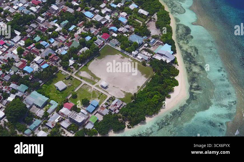 Aerial seascape of tropical coast beach holiday by shallow ocean and ...
