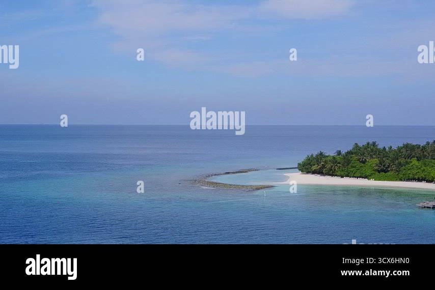 Aerial drone scenery of luxury coastline beach vacation by transparent ...
