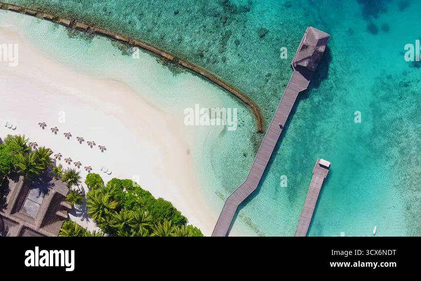 Aerial drone sky of marine shore beach trip by blue water with white ...