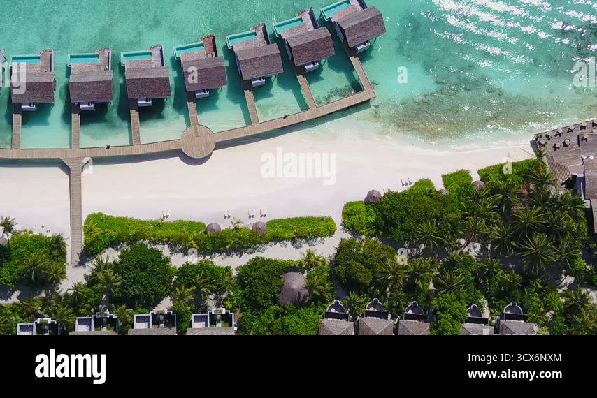 Aerial drone scenery of marine coast beach vacation by blue ocean with ...
