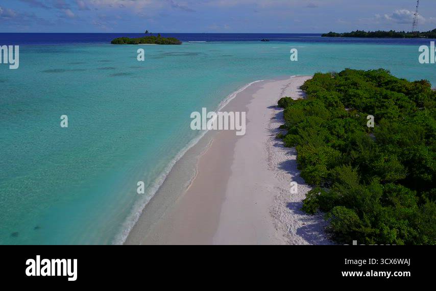 Aerial drone scenery of beautiful tourist beach journey by blue lagoon ...