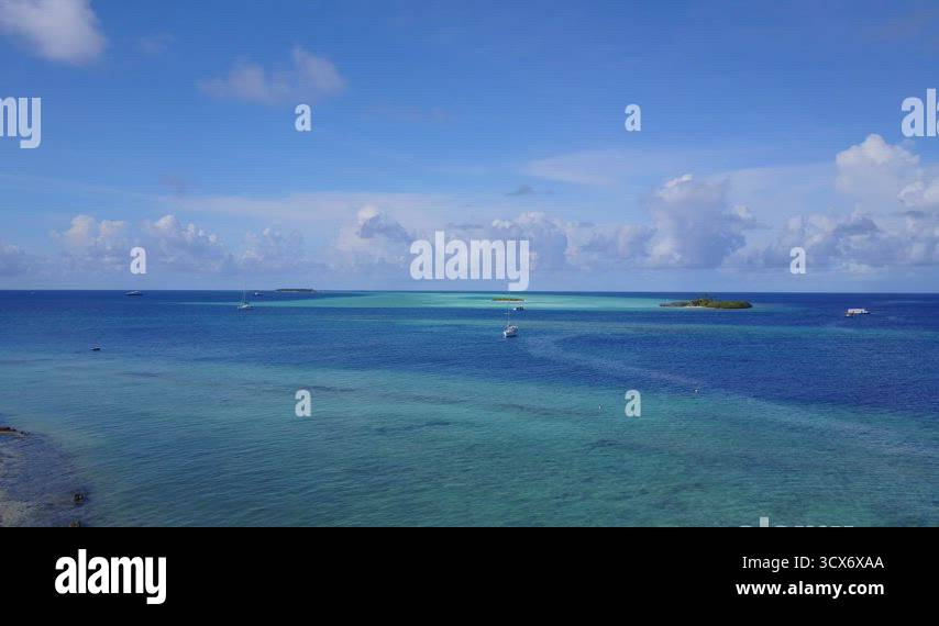 Aerial drone travel of luxury coast beach journey by aqua blue lagoon ...