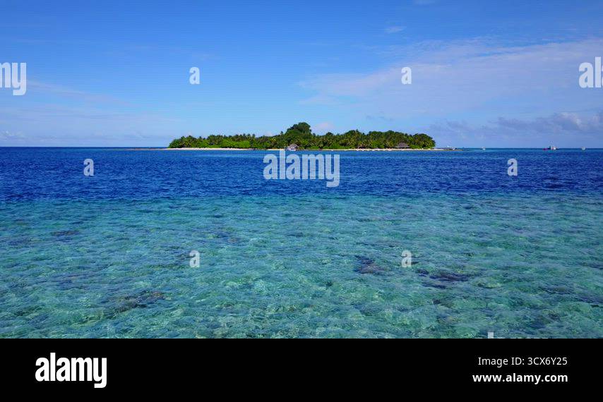 Empty landscape of exotic island beach adventure by blue sea and white ...