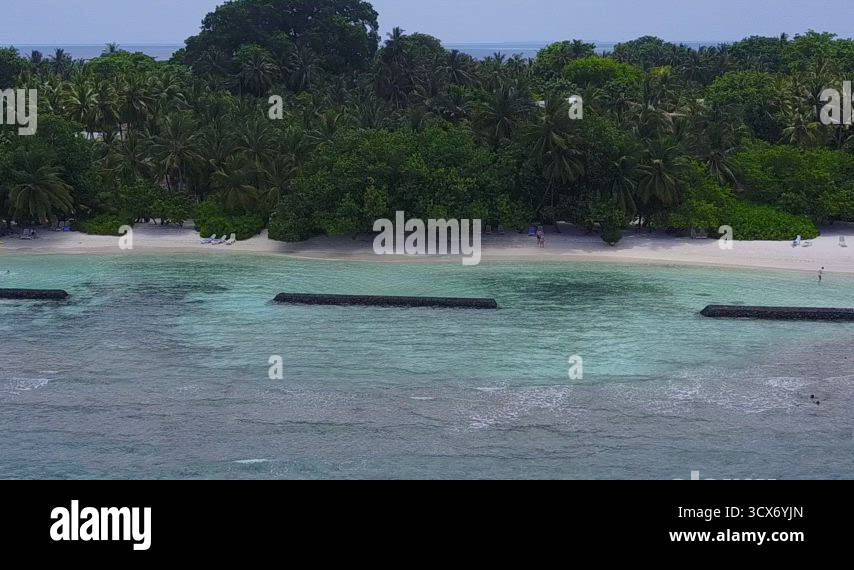 Daytime nature of relaxing coastline beach journey by blue lagoon with ...