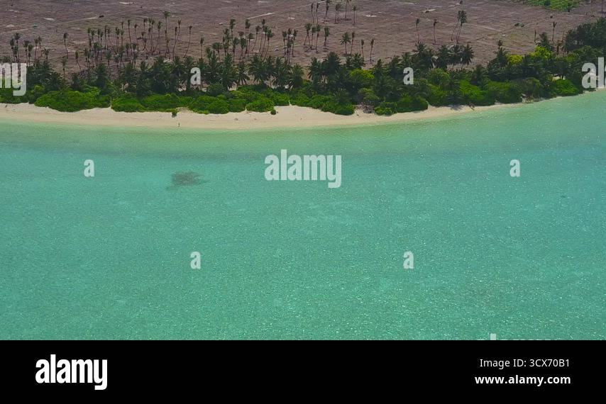 Wide angle panorama of tropical shore beach lifestyle by aqua blue ...