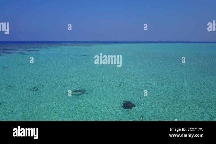 Close up scenery of tranquil seashore beach vacation by blue green ...
