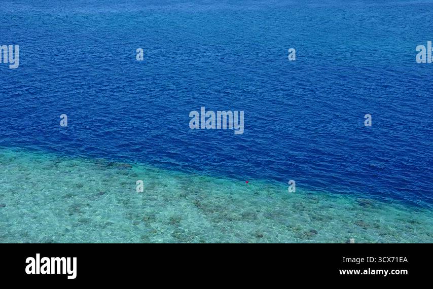 Wide angle seascape of marine sea view beach journey by blue water with ...