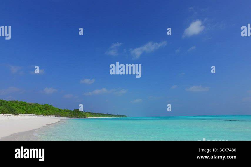 Daytime travel of exotic coast beach holiday by blue sea with bright ...