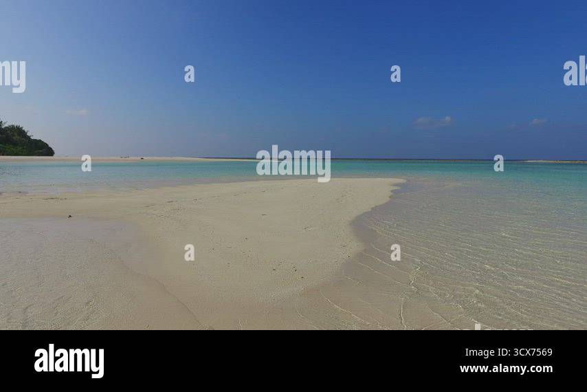 Daytime scenery of perfect resort beach voyage by blue green ocean with ...