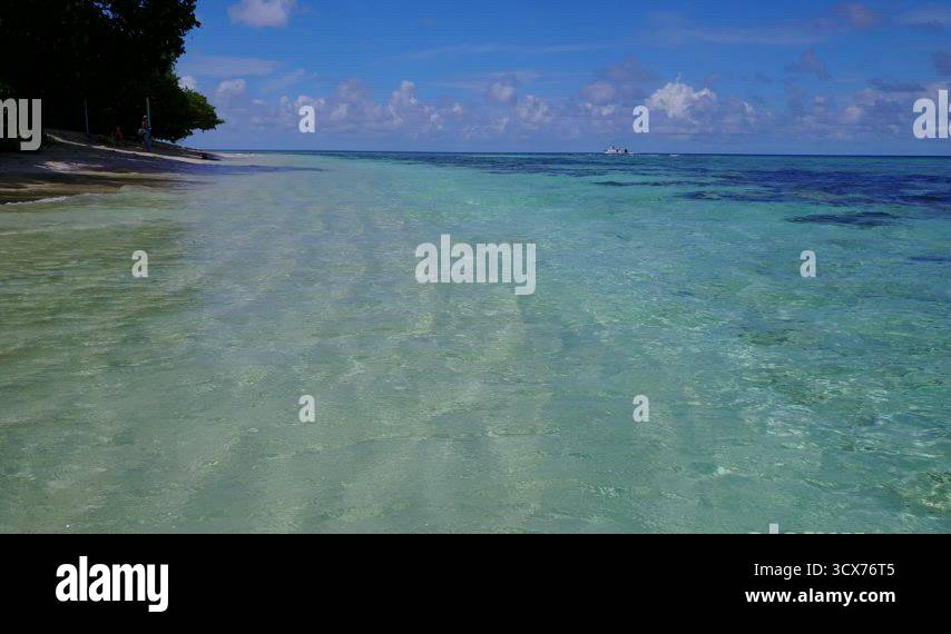 Warm tourism of exotic tourist beach trip by blue sea with bright sandy ...