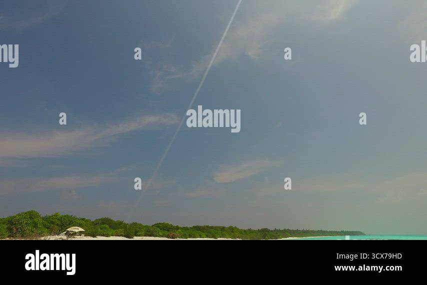 Sunny panorama of exotic coastline beach vacation by blue water with ...