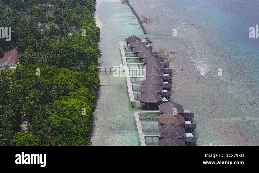 Wide angle scenery of beautiful coastline beach journey by shallow sea ...