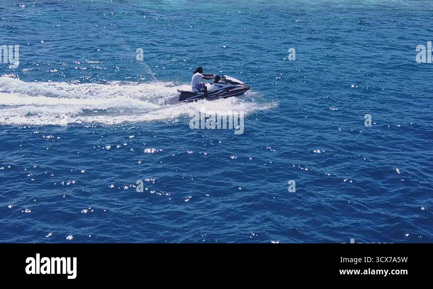 Wide angle scenery of exotic coast beach break by clear lagoon with ...