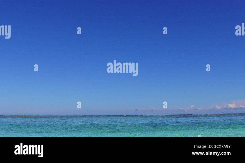 Sunny panorama of beautiful coast beach journey by blue ocean and white ...