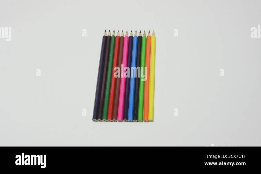 The hand moved a set of pencils with the center in the right corner ...